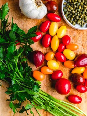 Italian Chicken With Capers And Cherry Tomato Sauce - Sip and Feast