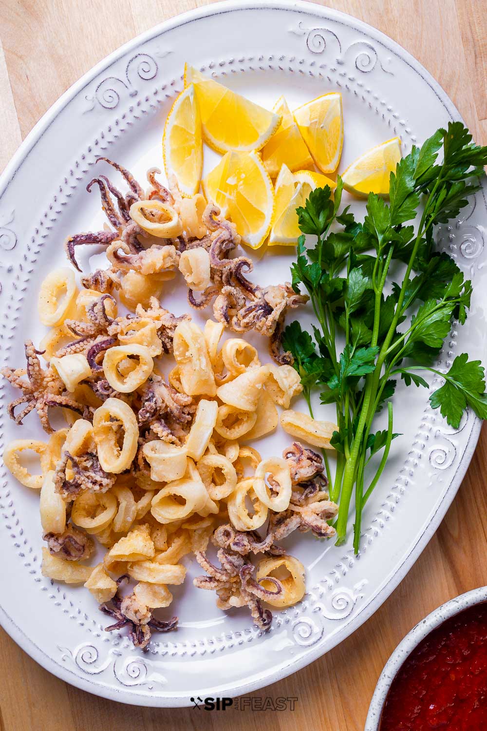 Fried Calamari - Light, Tender, and Crispy - Sip and Feast