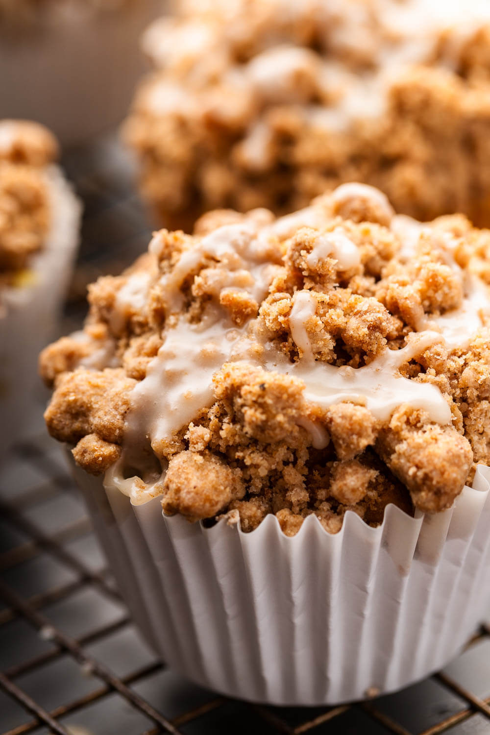 Pumpkin Crumb Cake Muffins - Sip and Feast
